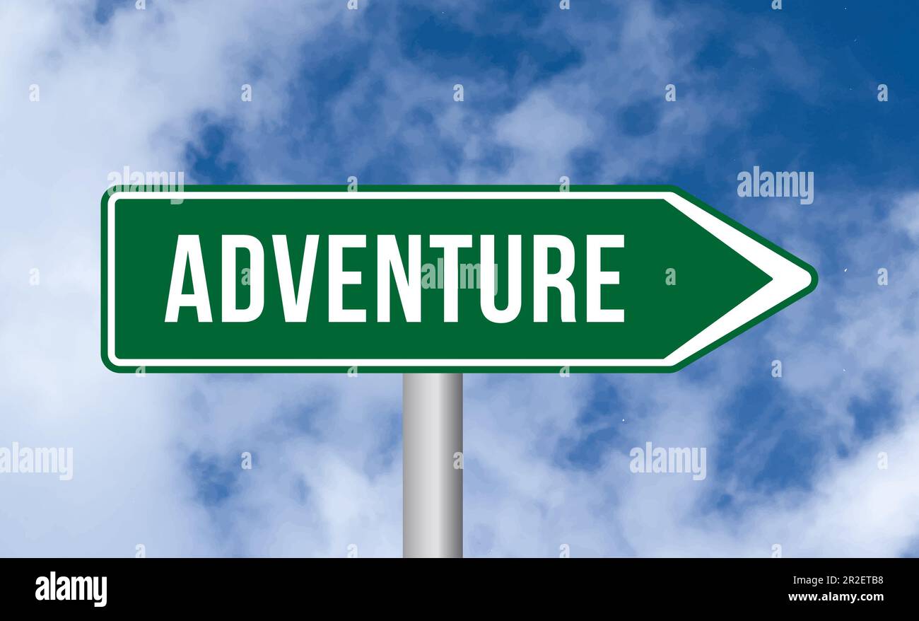 Adventure road sign on sky background Stock Photo - Alamy