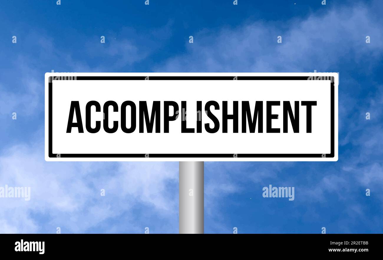 Accomplishment road sign on sky background Stock Photo - Alamy