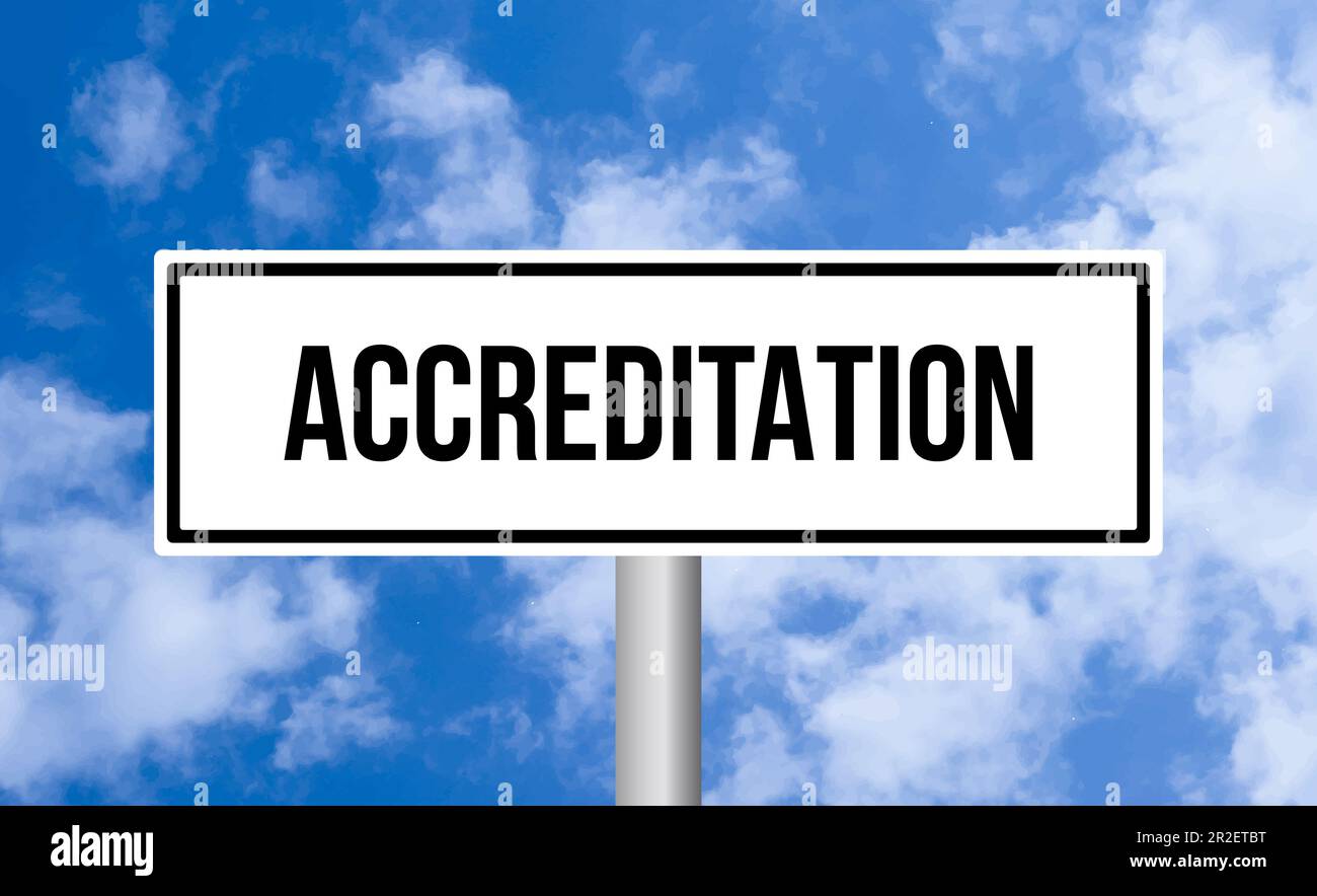 Accreditation road sign on cloudy sky background Stock Photo - Alamy