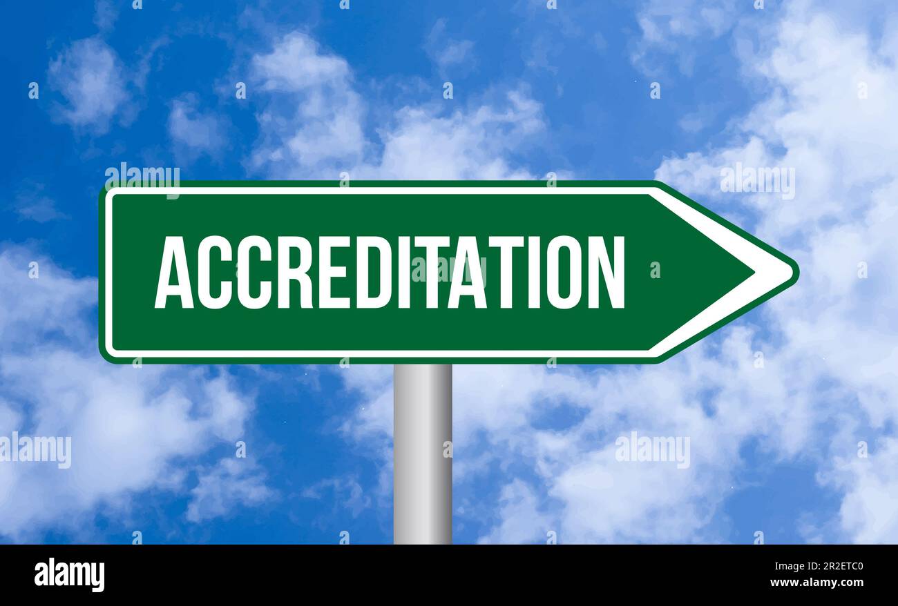 Accreditation road sign on cloudy sky background Stock Photo - Alamy