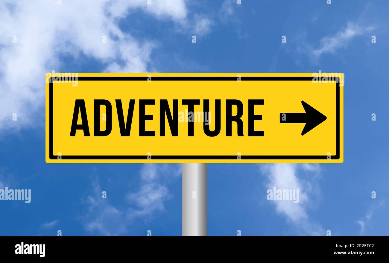 Adventure road sign on sky background Stock Photo - Alamy