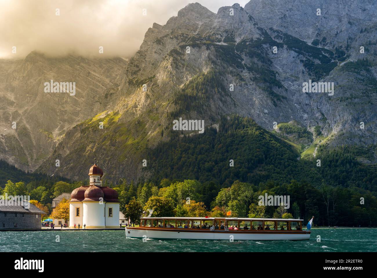 St. Bartholomä pilgrimage church and passenger ship in front of ...
