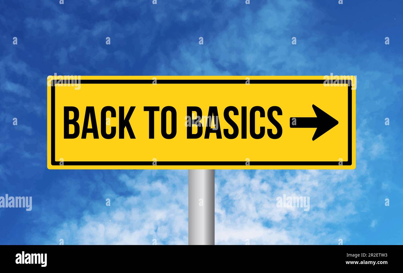 Back to basics road sign on blue sky background Stock Photo - Alamy