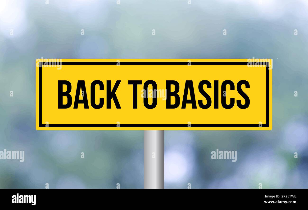 Back to basics road sign on blur background Stock Photo - Alamy