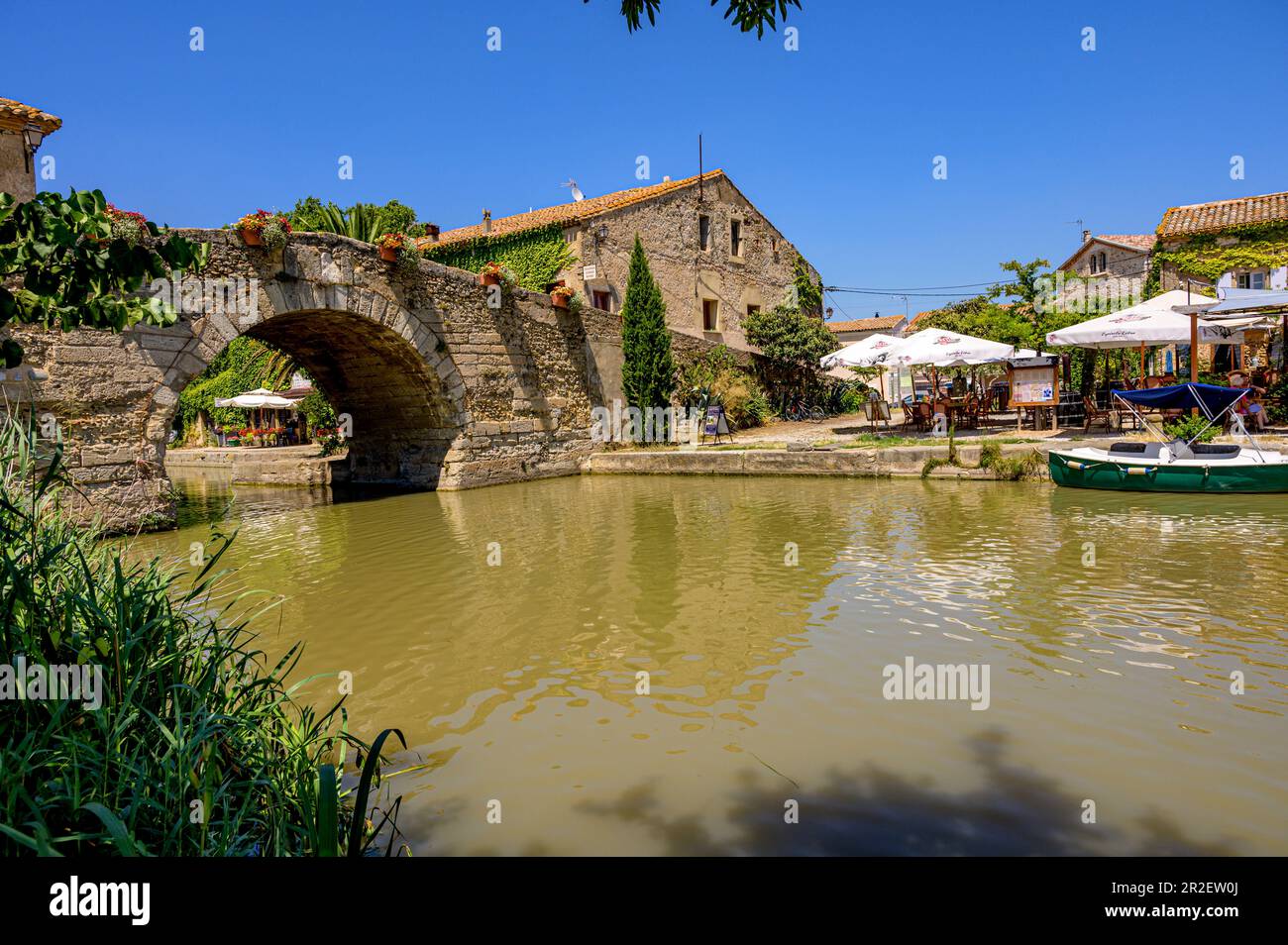 Boats in Le Somail on the Canal du Midi, Occitania, France Stock Photo ...
