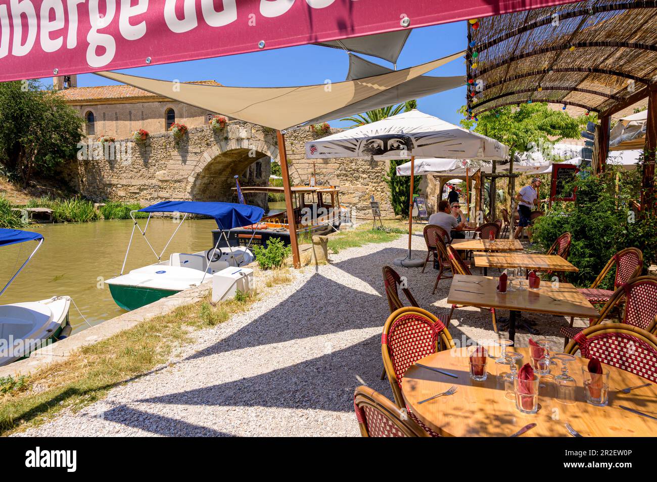 Boats in Le Somail on the Canal du Midi, Occitania, France Stock Photo ...