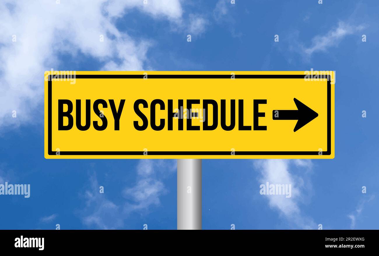 Busy schedule road sign on blue sky background Stock Photo - Alamy