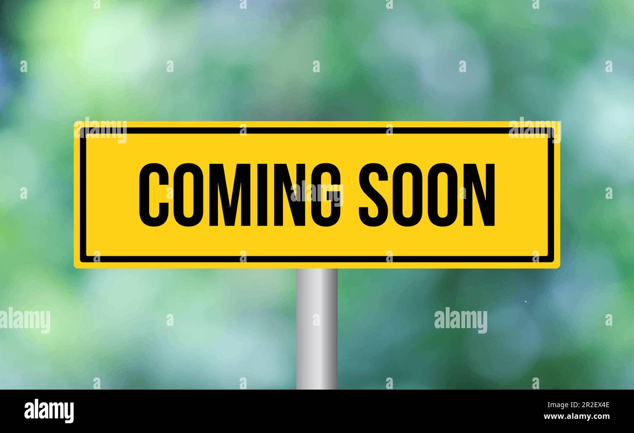 Coming soon road sign on blur background Stock Photo - Alamy