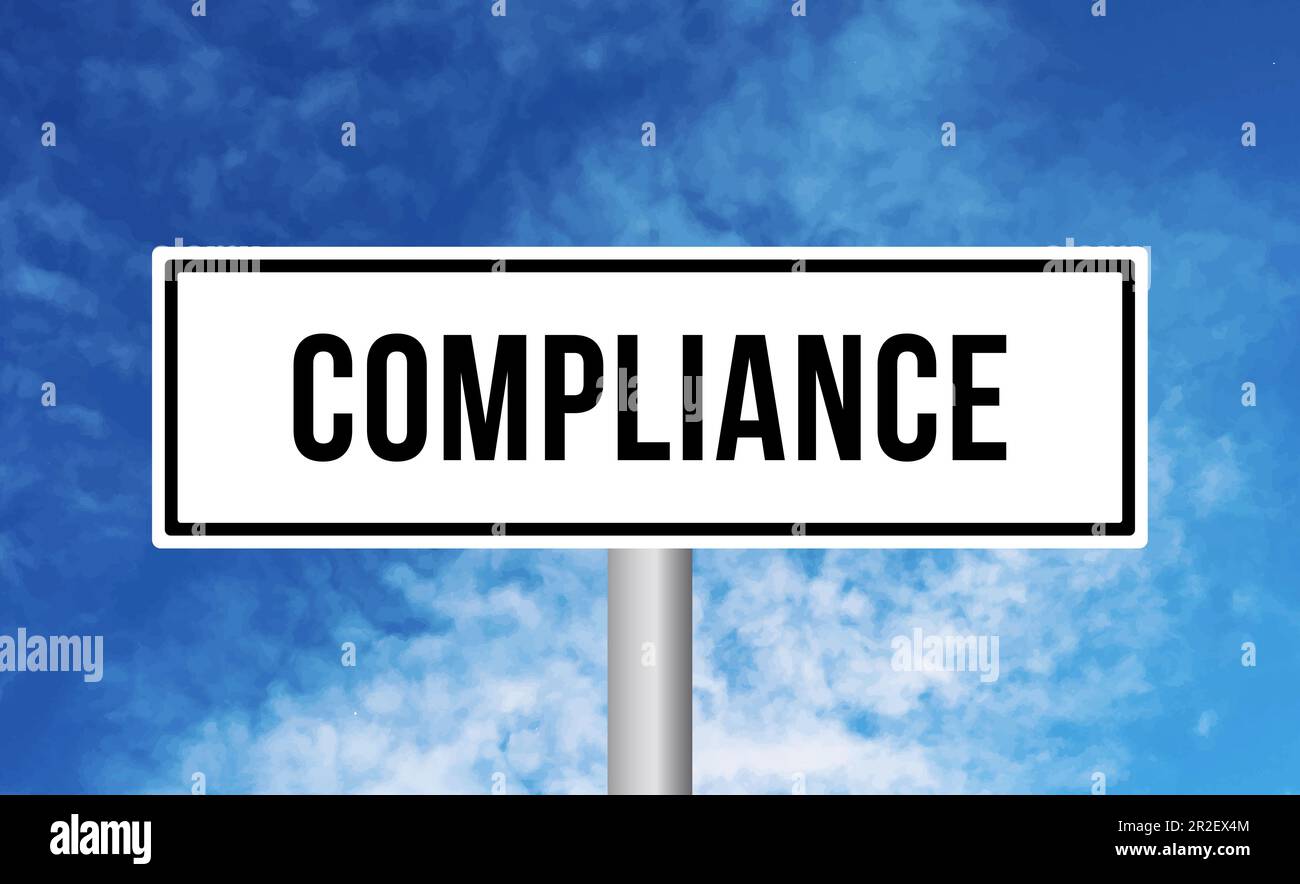 Compliance road sign on sky background Stock Photo - Alamy