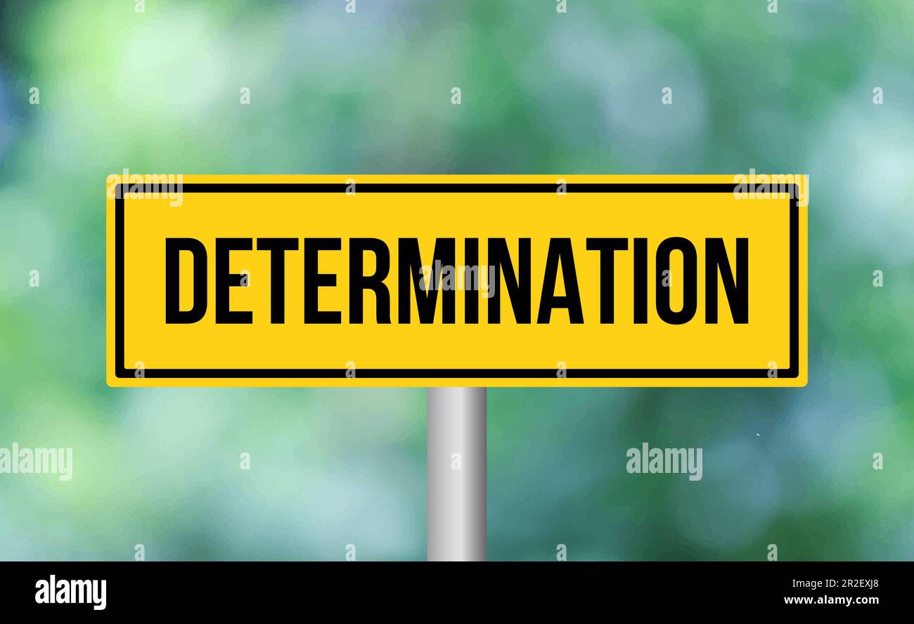 Determination road sign on blur background Stock Photo - Alamy