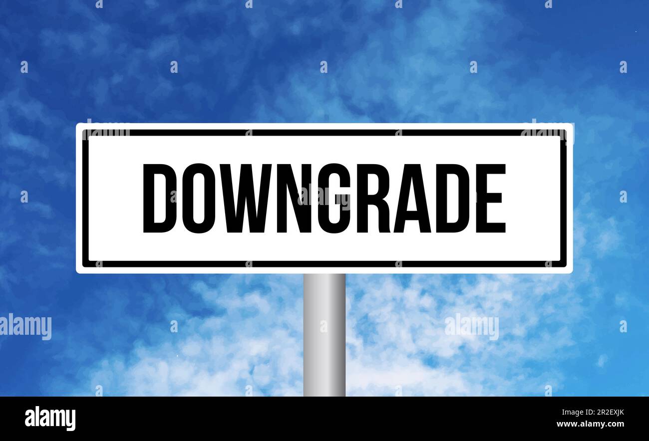 Downgrade road sign on sky background Stock Photo - Alamy
