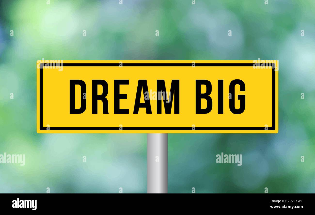 Dream big road sign on blur background Stock Photo - Alamy