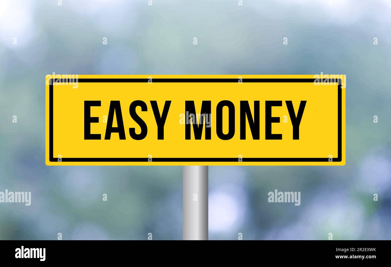 Easy money road sign on blur background Stock Photo - Alamy