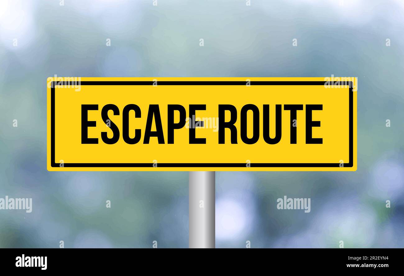 Escape route road sign on blur background Stock Photo - Alamy