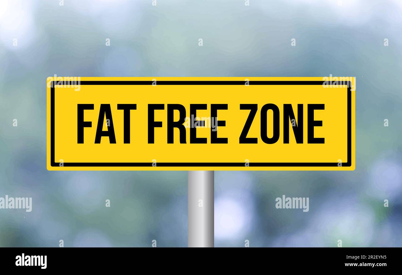 Fat free zone road sign on blur background Stock Photo - Alamy