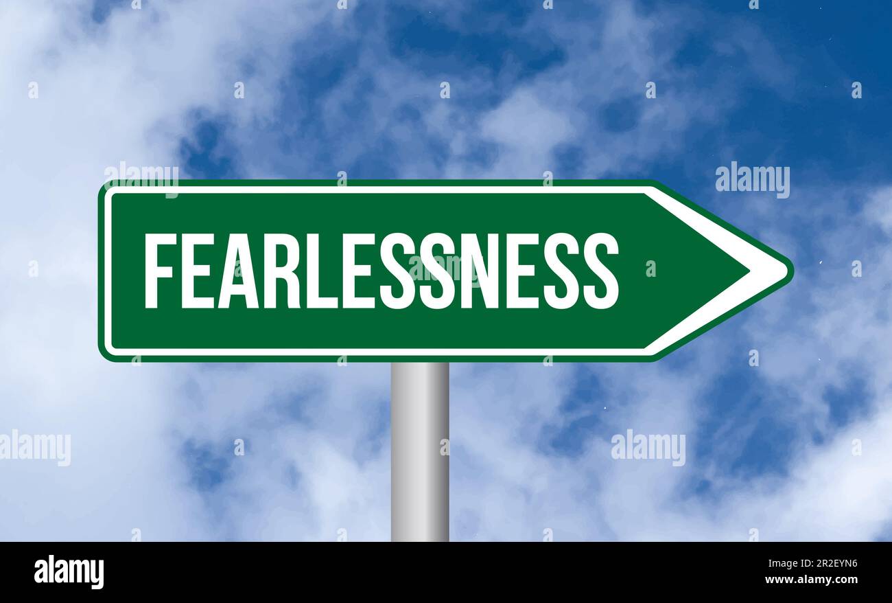 Fearlessness road sign on sky background Stock Photo - Alamy