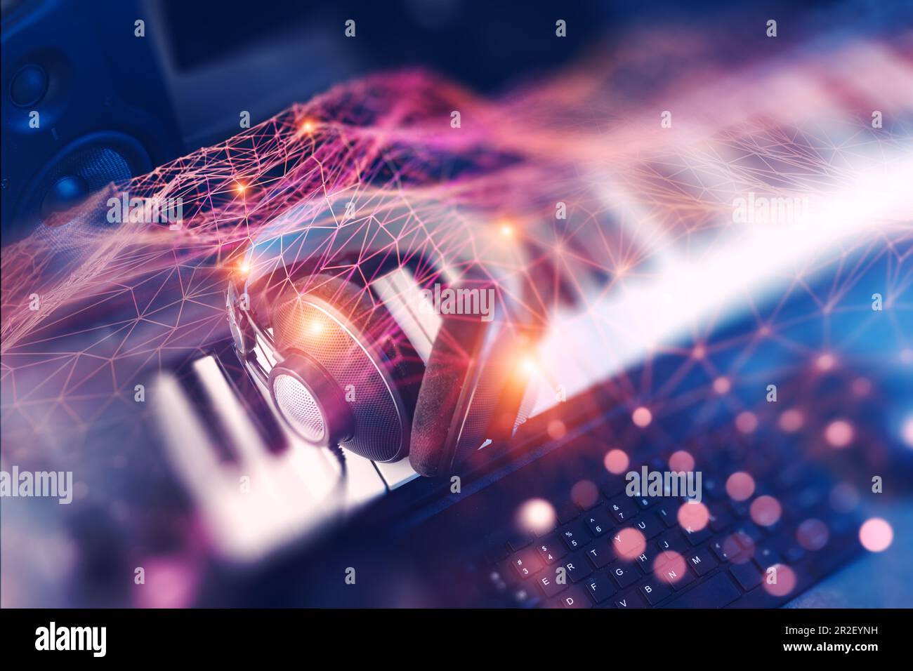 Earphone and keyboard over colorful lights background. Song, music ...