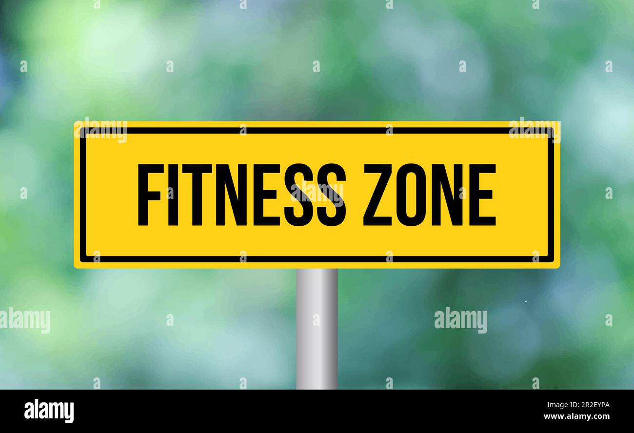 Fitness zone road sign on blur background Stock Photo - Alamy