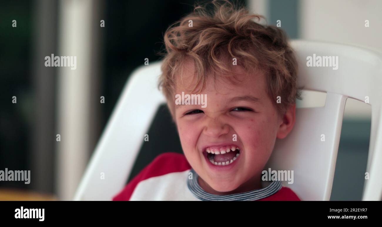 Happy handsome child toddler boy smiling and laughing, authentic real ...