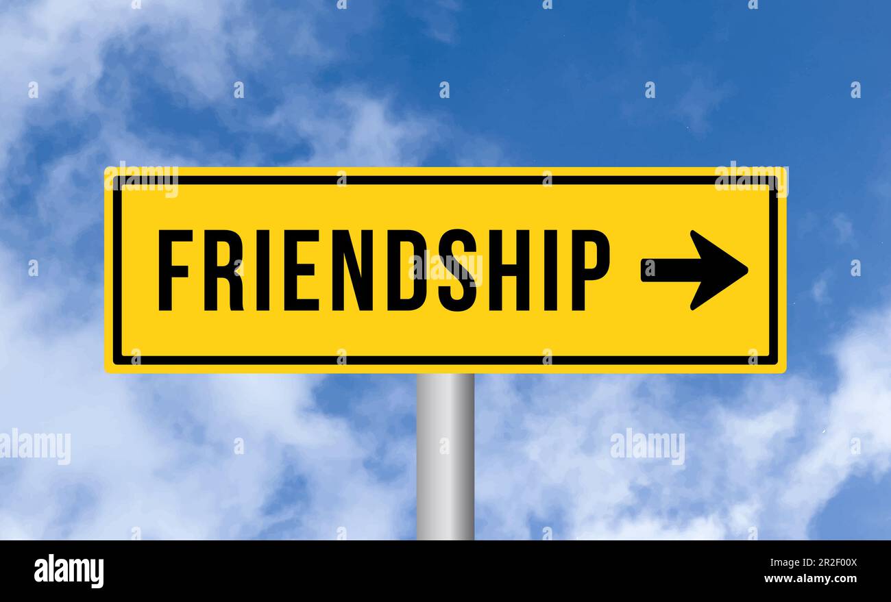 Friendship road sign on cloudy sky background Stock Photo - Alamy