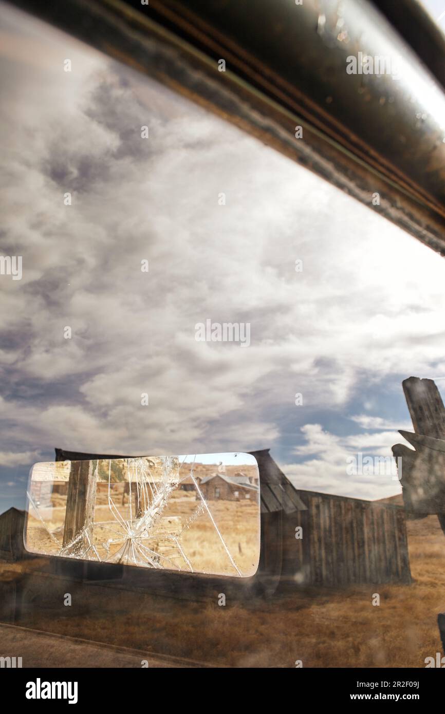 View of a broken rear view mirror in the ghost town of Bodie. Eastern ...