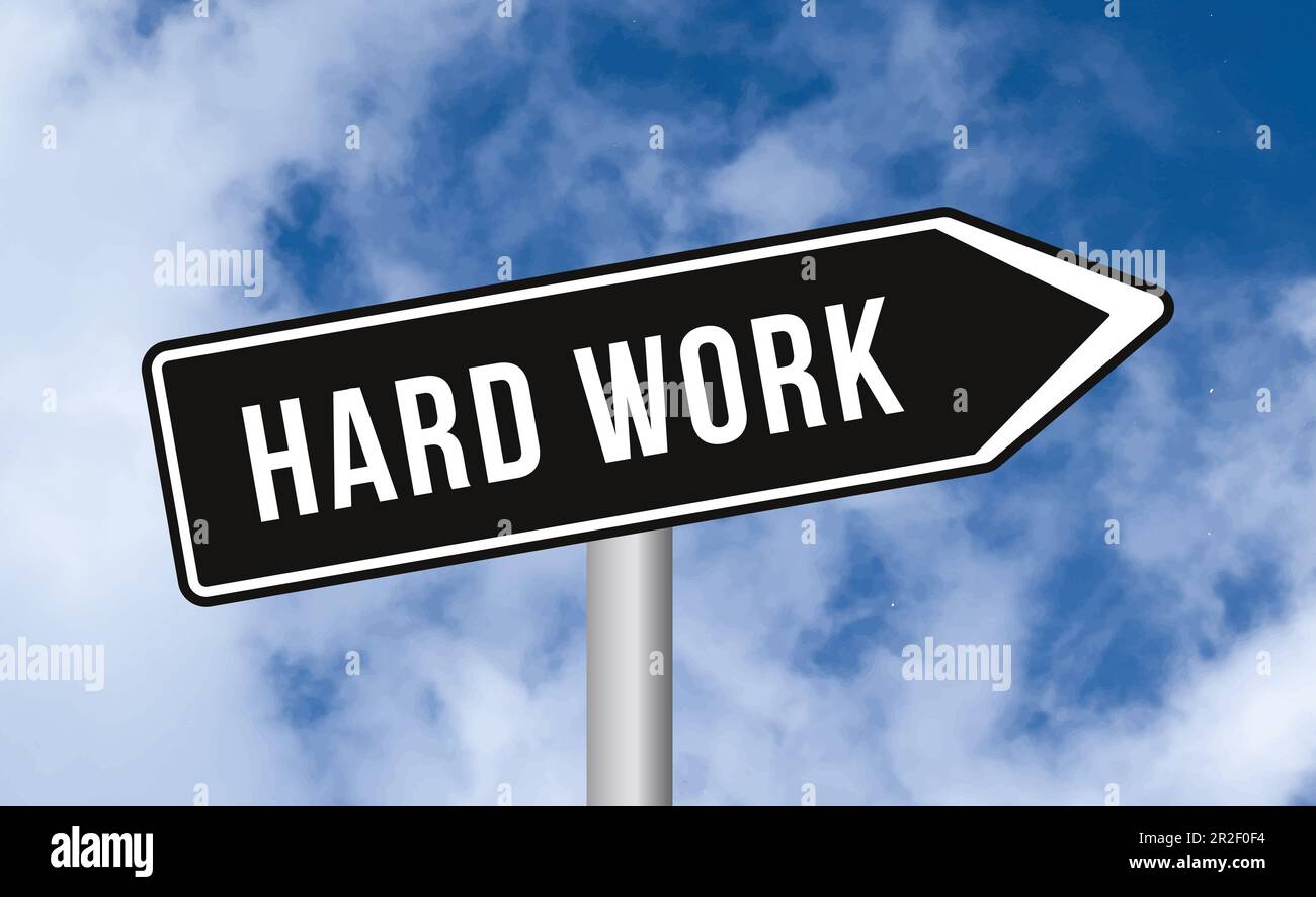 Hard work road sign on sky background Stock Photo - Alamy