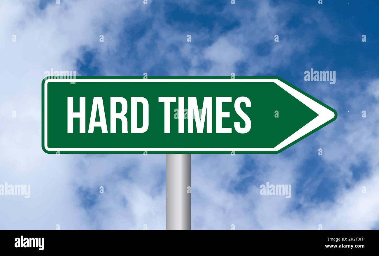 Hard times road sign on cloudy sky background Stock Photo - Alamy