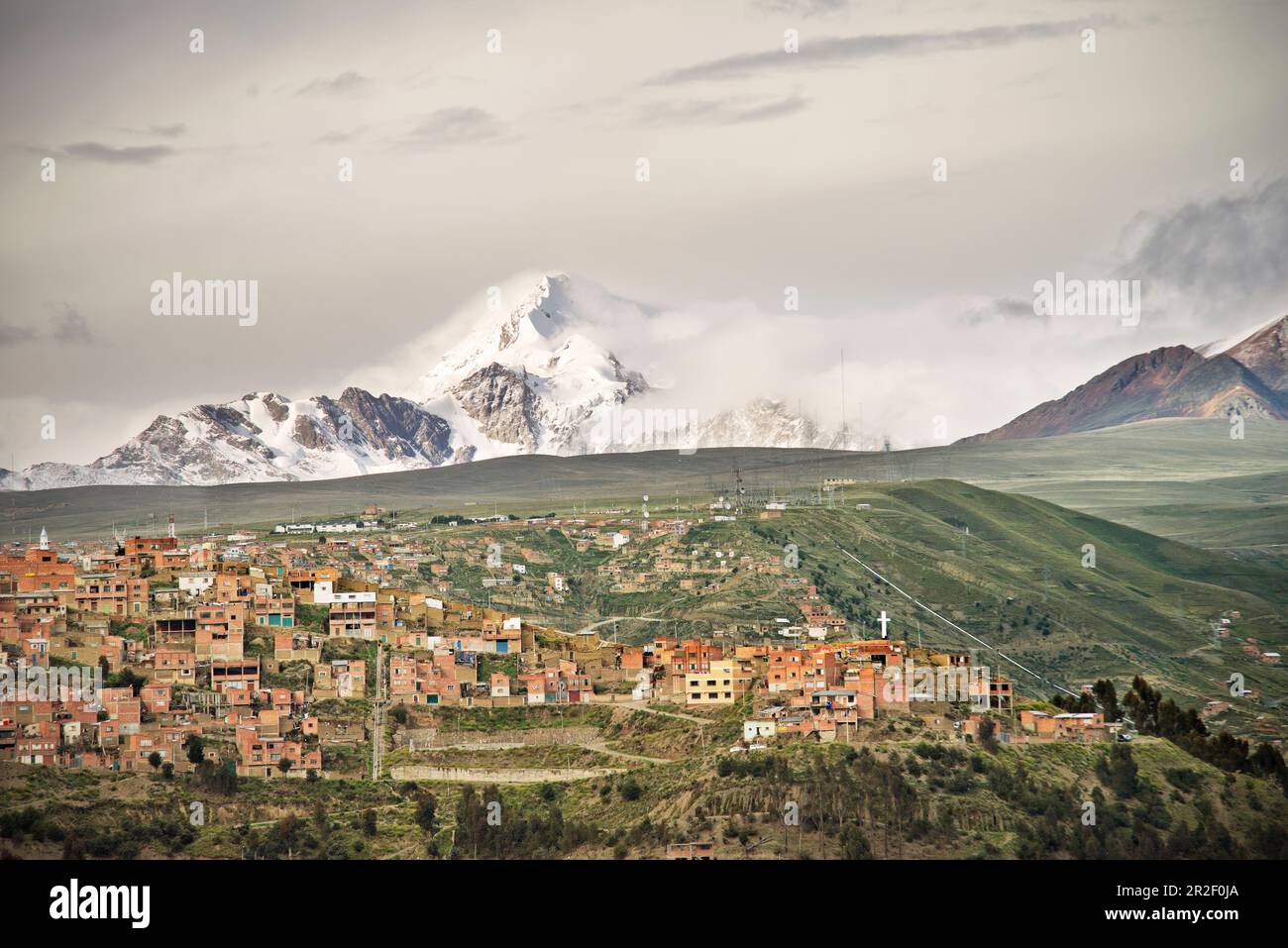View from El Alto of the Andes and housing development on the steep ...