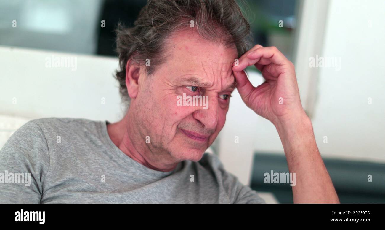 Concerned older man thinking about life, senior person thinking of the ...