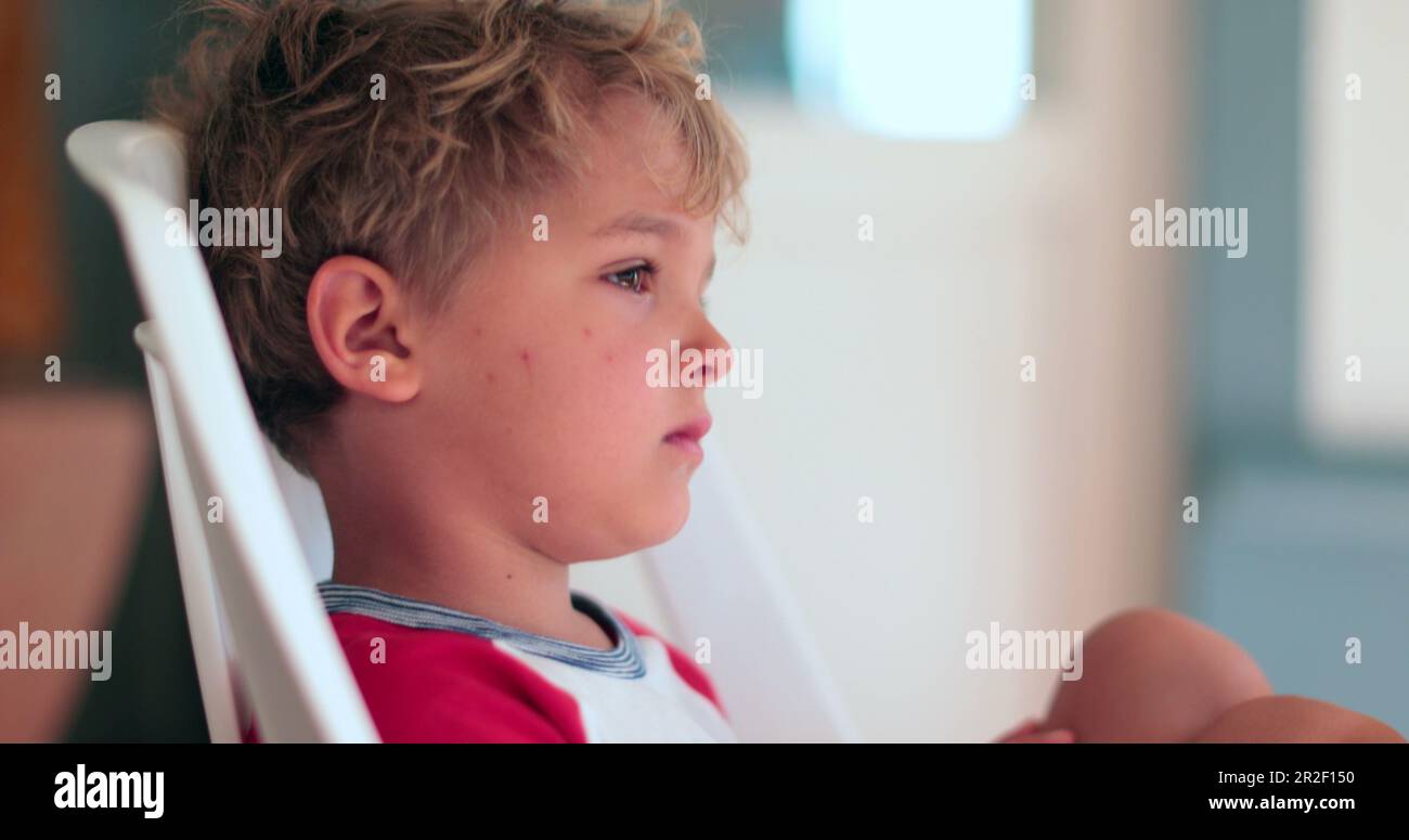 Contemplative handsome blond child boy. Pensive kid face Stock Photo ...