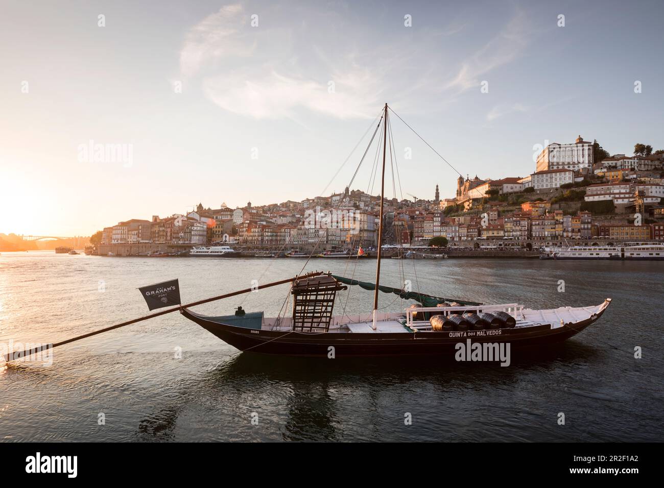 Traditional ships on the Douro river in Porto at sunset, Portugal Stock ...
