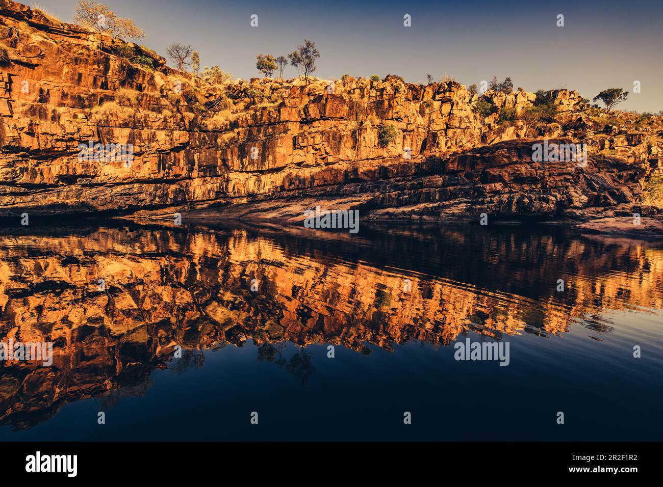 Sunrise and reflection at Bell Gorge with the waterfall in the ...