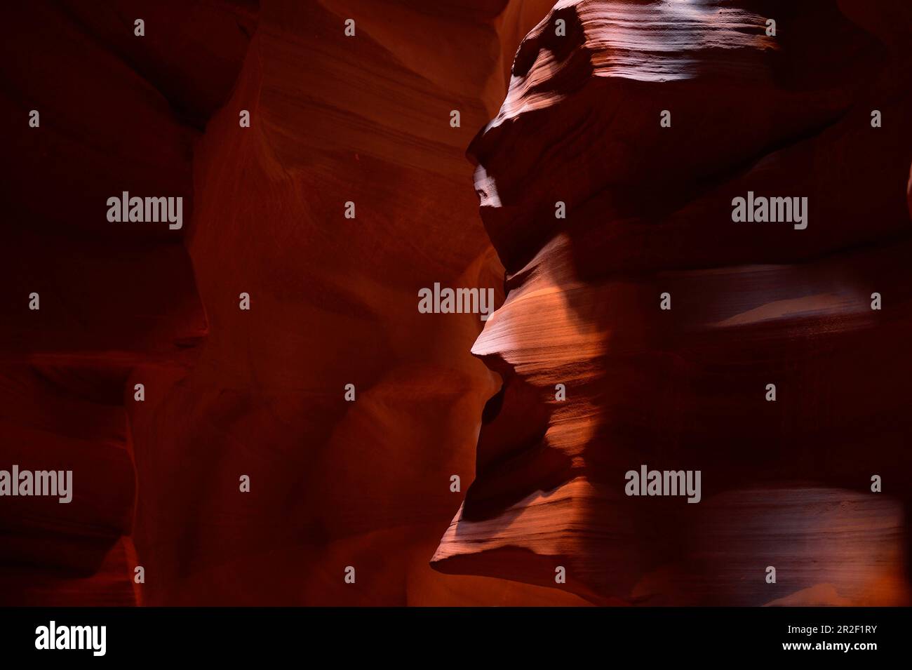 A colored rock that looks like the profile of a face in Antelope Canyon ...