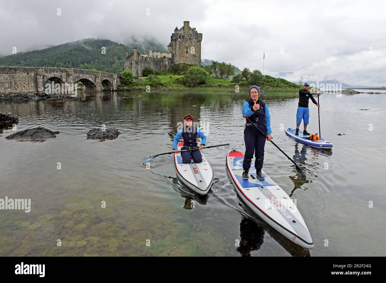 Stand up paddle boarding at Loch Duich, Eilean Donan Castle, Dornie ...