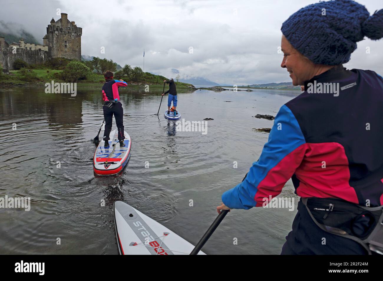 Stand up paddle boarding at Loch Duich, Eilean Donan Castle, Dornie ...