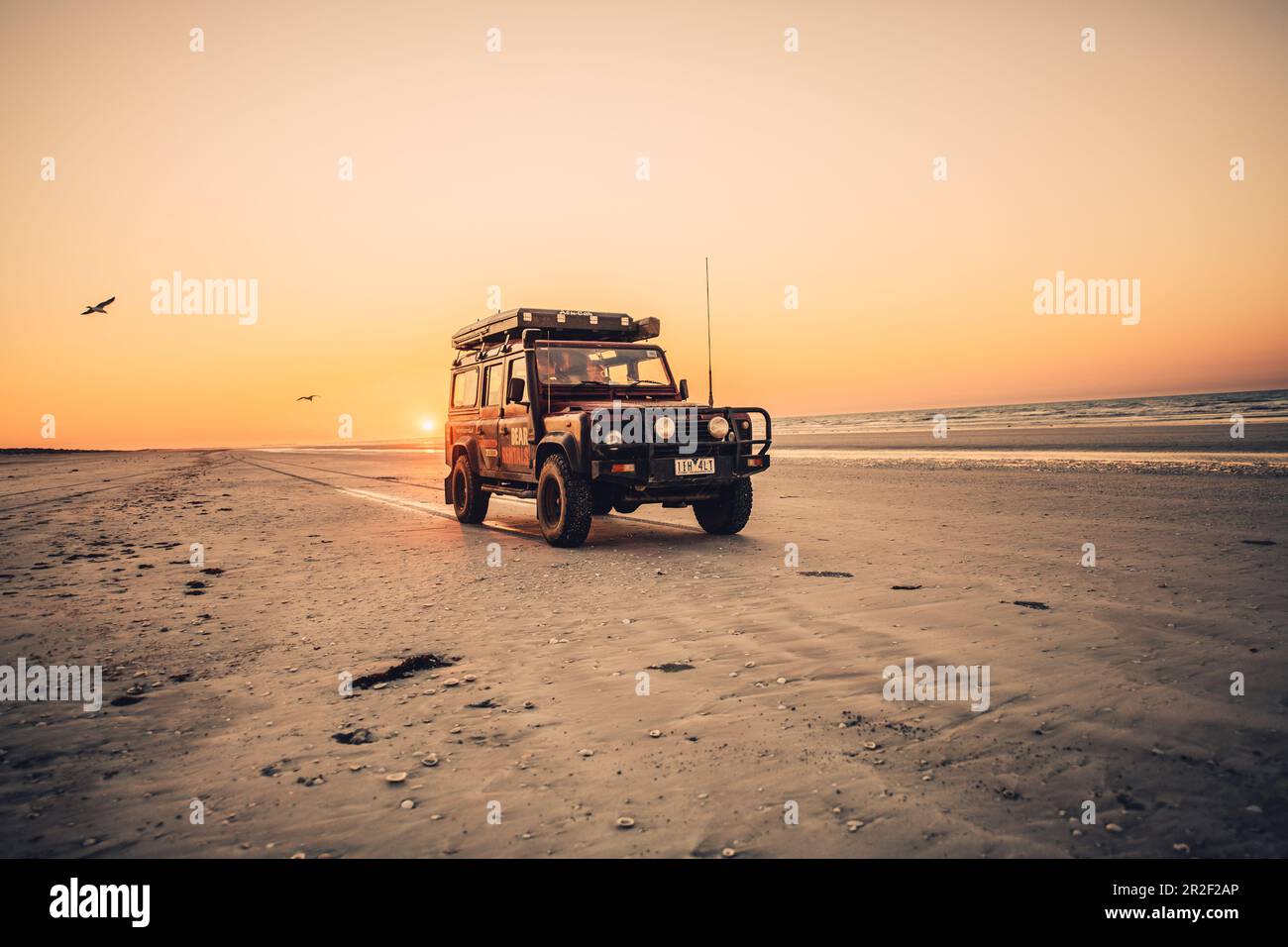 Off-road vehicle on 80 Mile Beach in Western Australia, Australia ...
