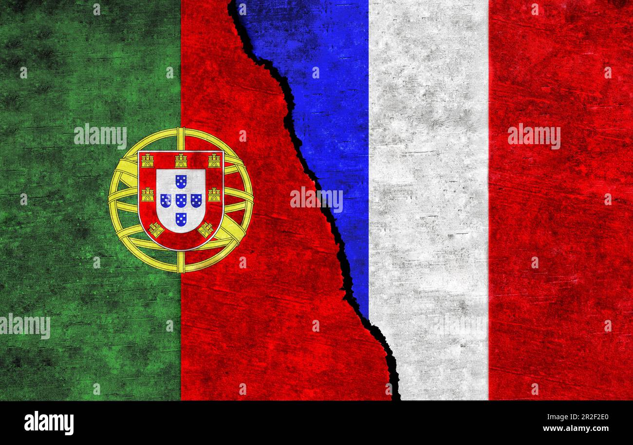 France and Portugal flag on wall with crack. Diplomatic relations ...