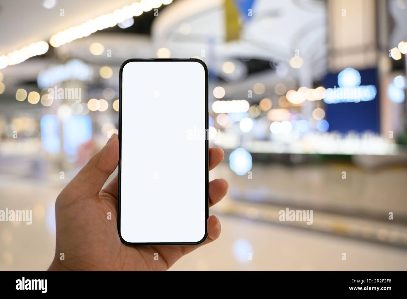Mobile app advertisement, People showing empty screen of smart phone ...