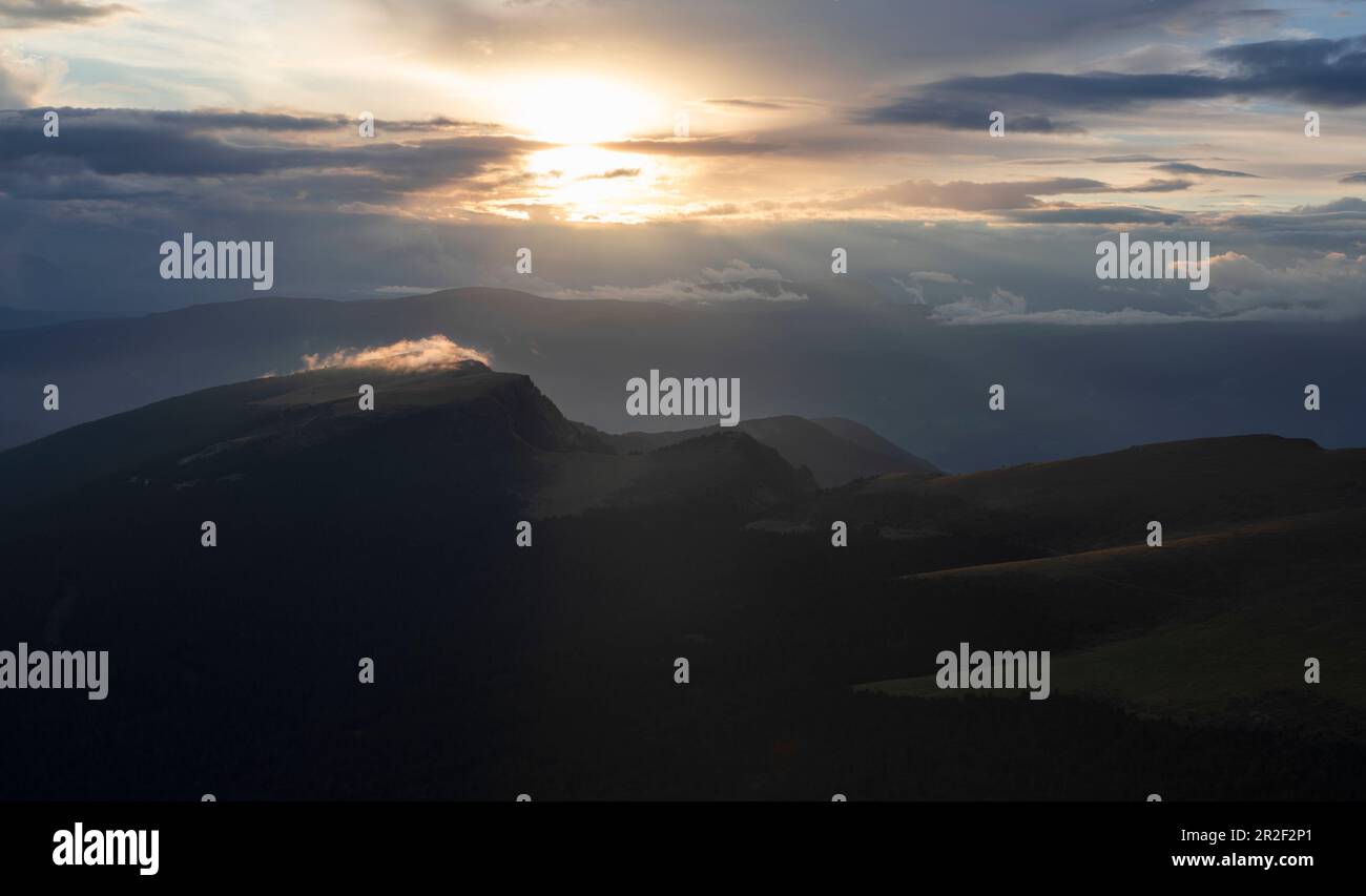 View of the mountain flank of Seceda with clouds at sunset in the ...