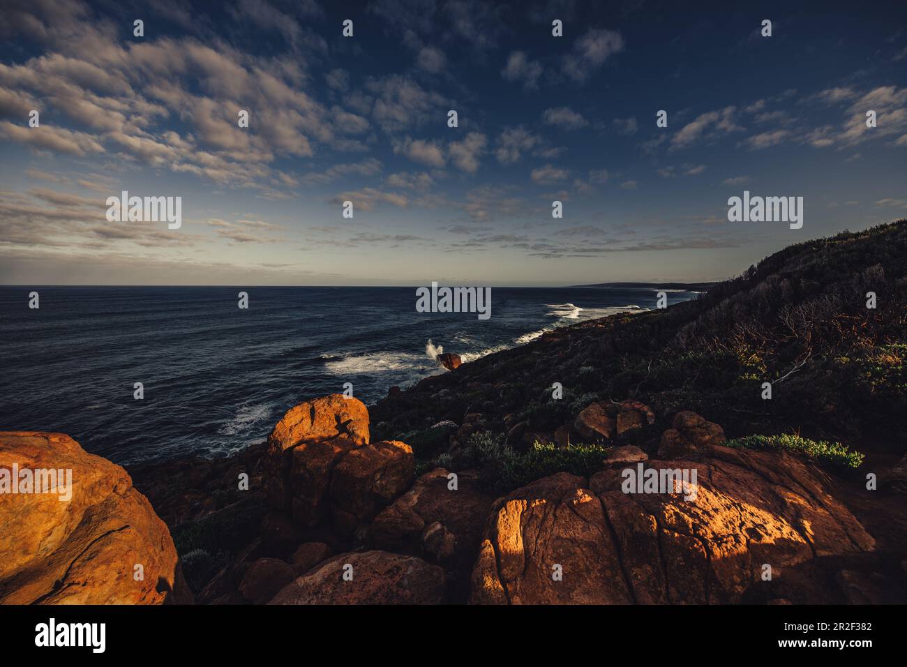 Reddish red river rocks hi-res stock photography and images - Alamy