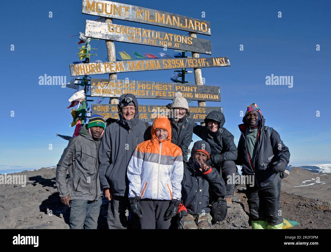Kilimanjaro, arrived at Uhuru Peak, highest point 5895 meters, our family with the mountain ...