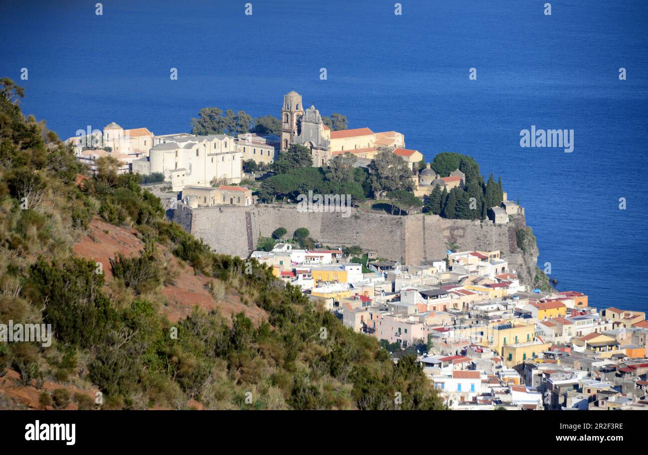 by the sea, view to the island's capital with its castle, Lipari ...