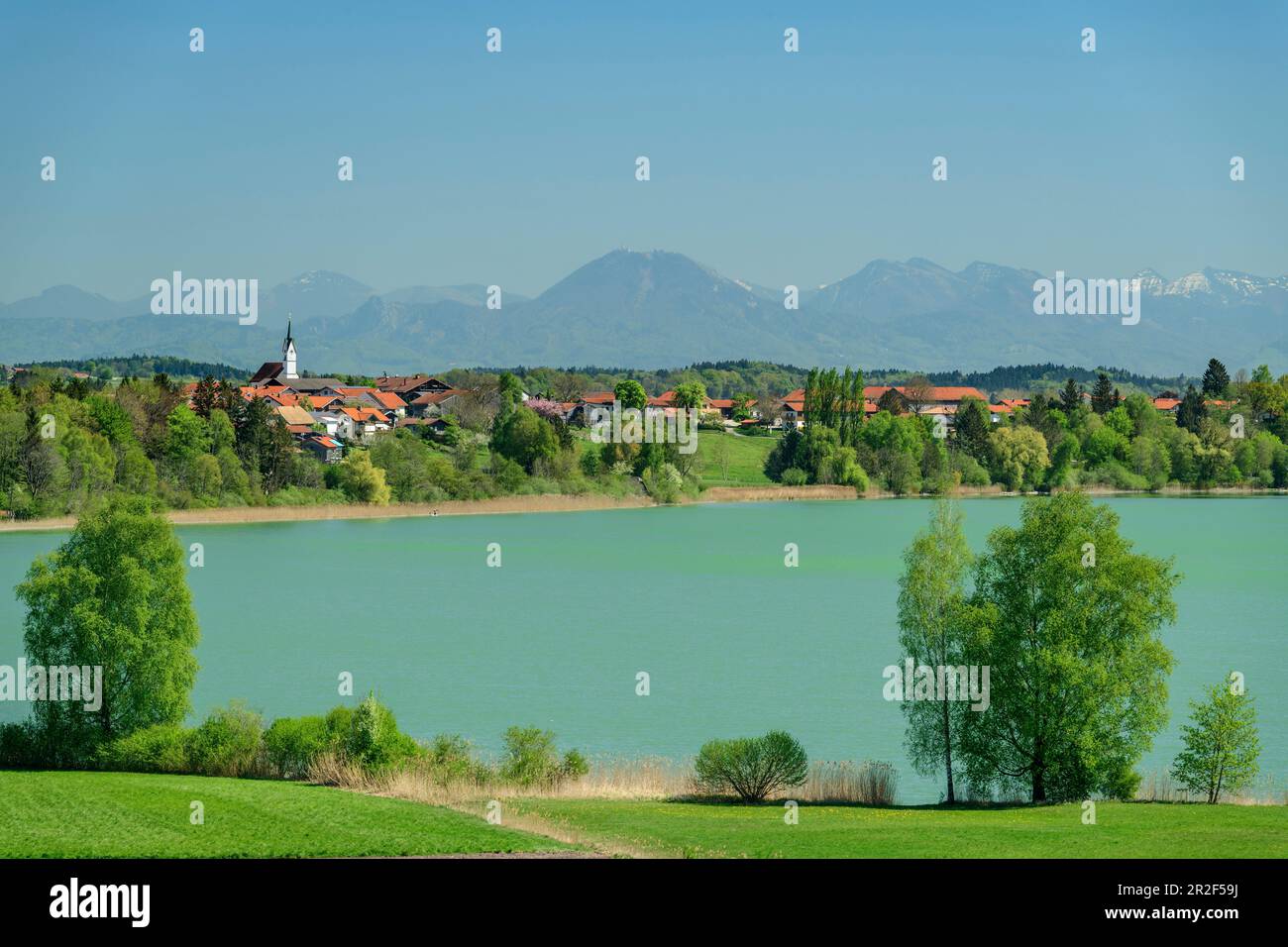 Tachinger See with the village of Tettenhausen and Salzkammergut ...