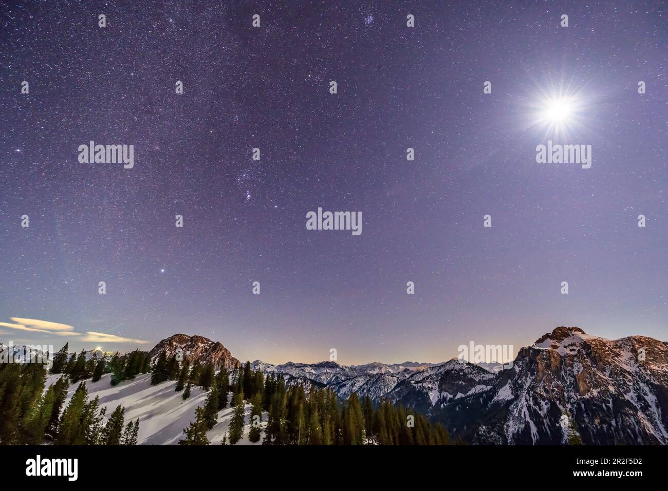 Starry sky and brightly shining moon over Straußberg and Säuling, from ...