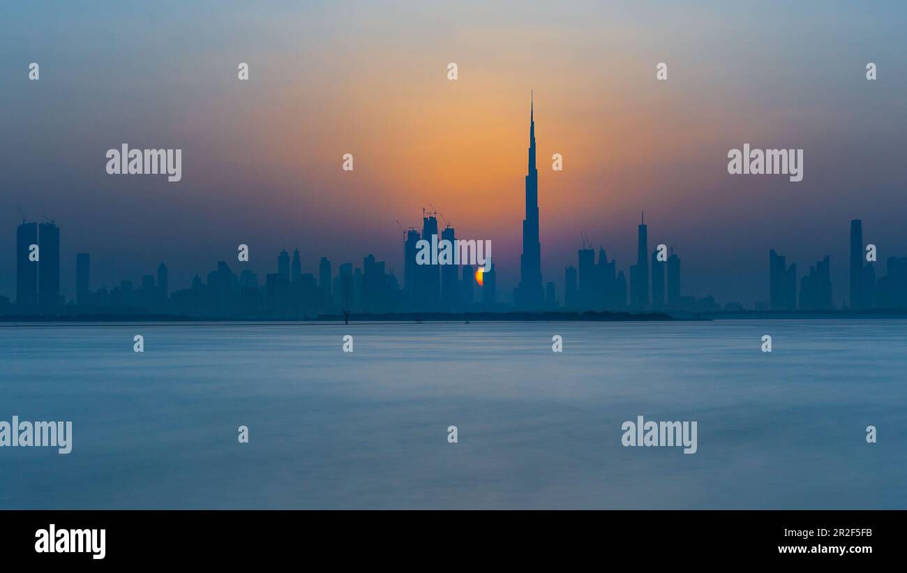 The city skyline just before sunset in Dubai, UAE Stock Photo - Alamy