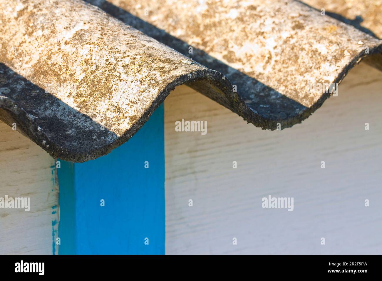 Old aged dangerous asbestos roof made of concrete panels - one of the ... Old aged dangerous asbestos roof made of concrete panels - one of the ...