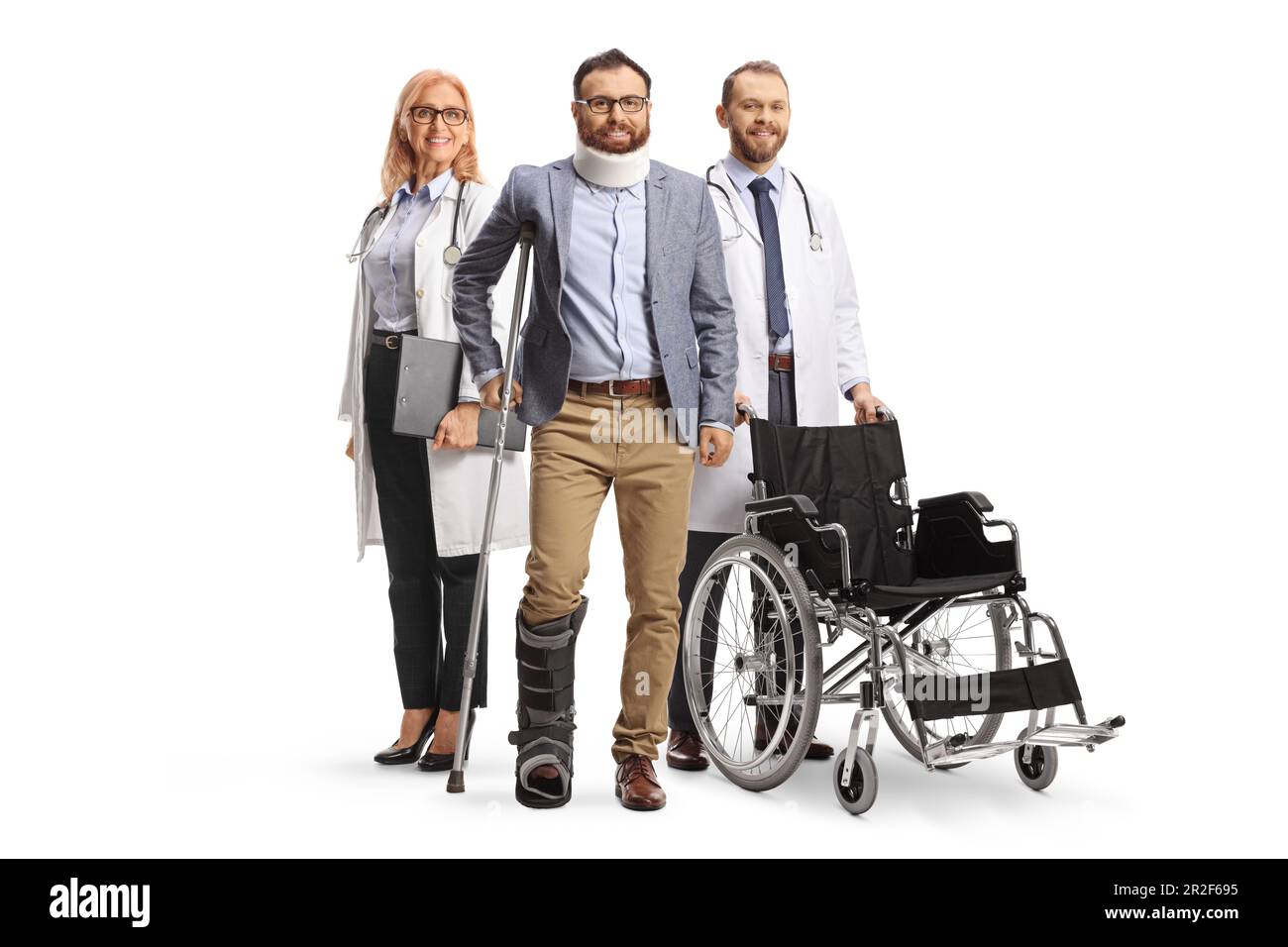 Man with a walking brace recovering from an injury and posing with team ...