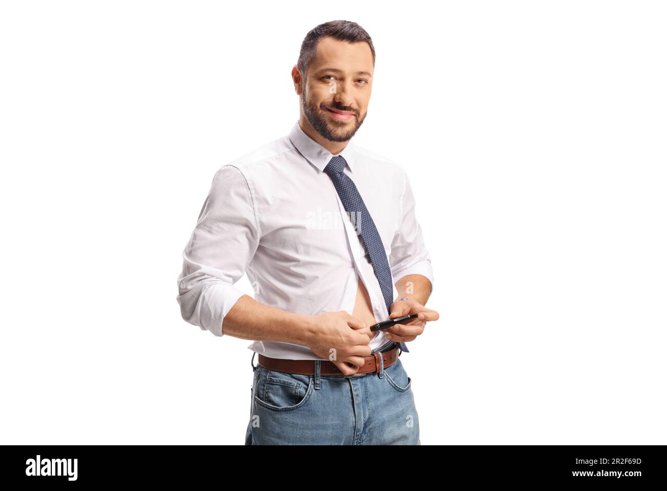 Young man injecting insulin shot in the belly and smiling isolated on ...