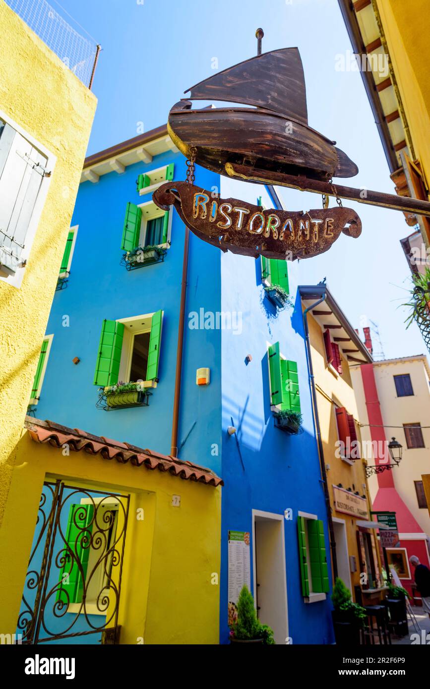 Colorful house facades in Caorle, Veneto, Italy Stock Photo - Alamy