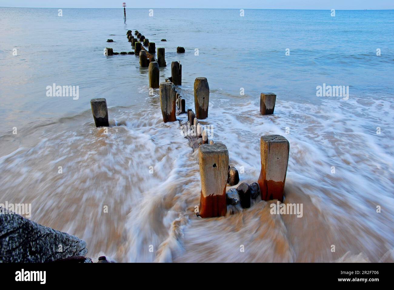 Sea defence groynes waves hi-res stock photography and images - Alamy